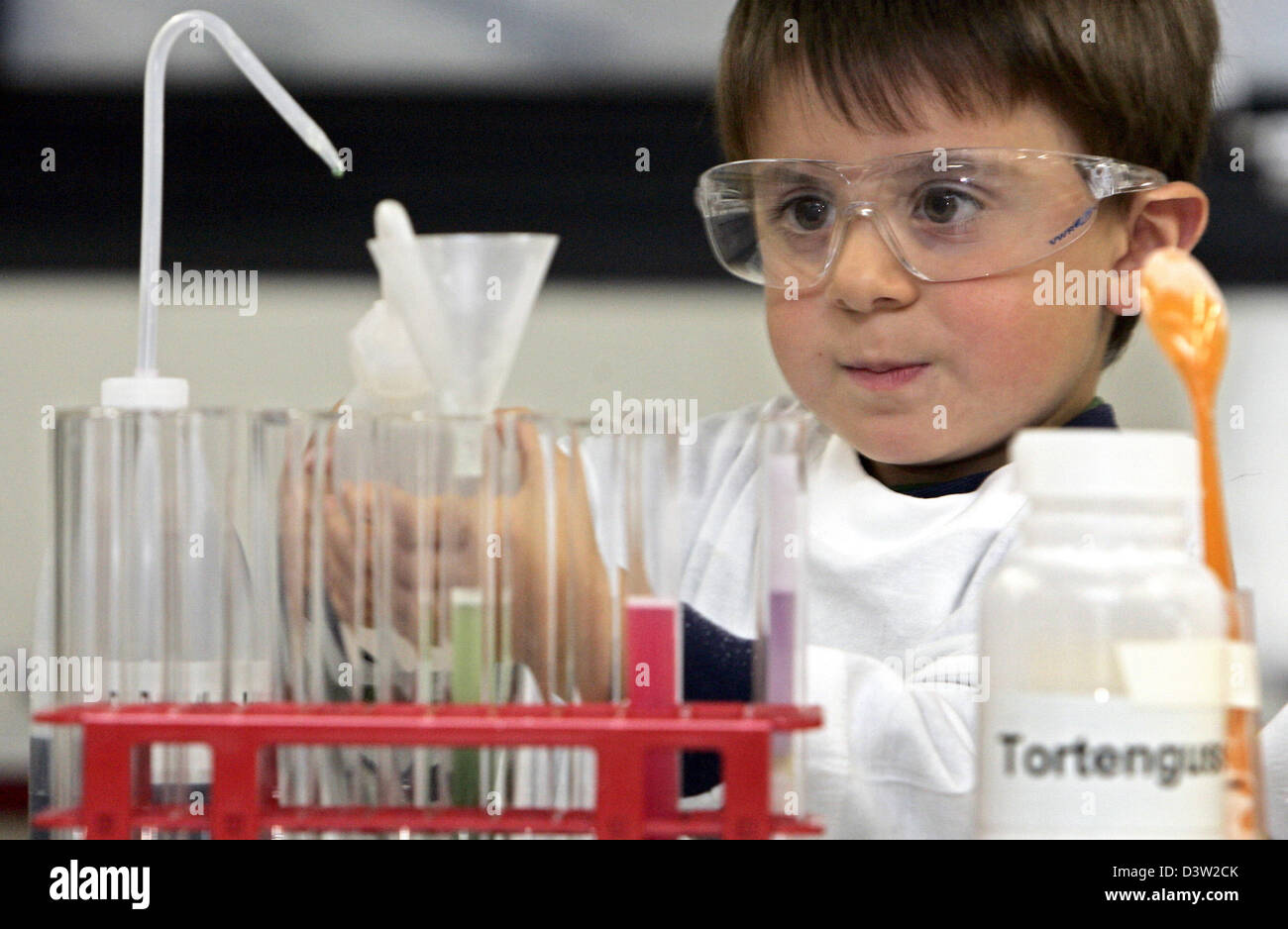 Children conduct an experiment in a laboratory of the university ...