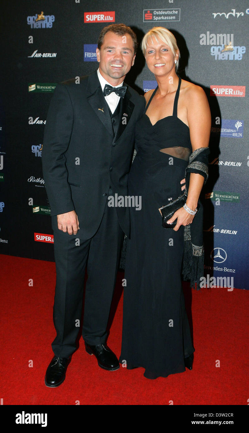 Former pro boxer Sven Ottke (L) and his wife Gaby (R) arrive to the ...