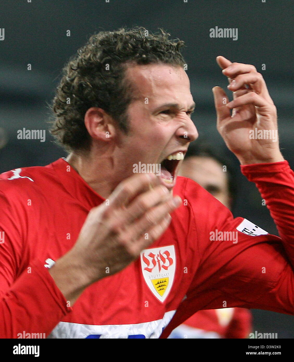Stuttgart's Marco Streller (C) cheers his 1-0 lead and winner during ...