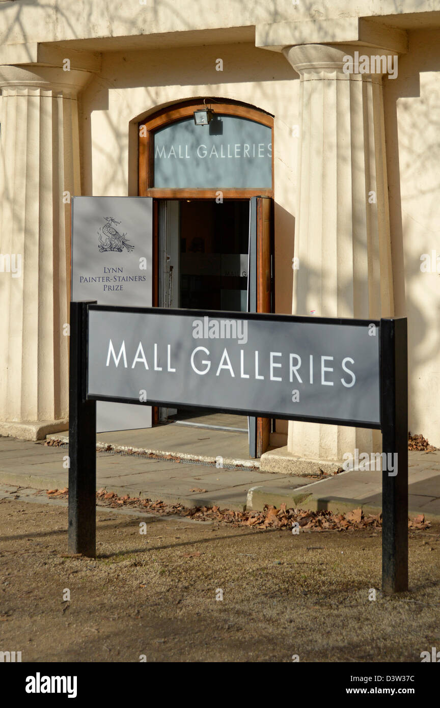 entrance and sign for the Mall Galleries in Carlton House Terrace is ...