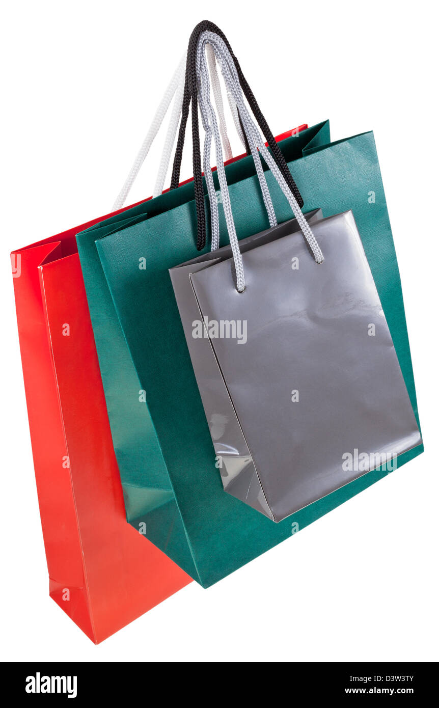 three paper shopping bags isolated on white backgrounds Stock Photo - Alamy