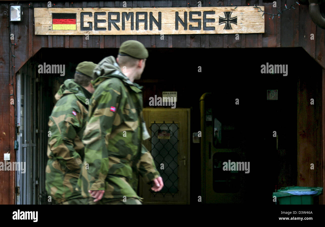 German Bundswehr soldiers pass the food supply base of the KFOR base ...