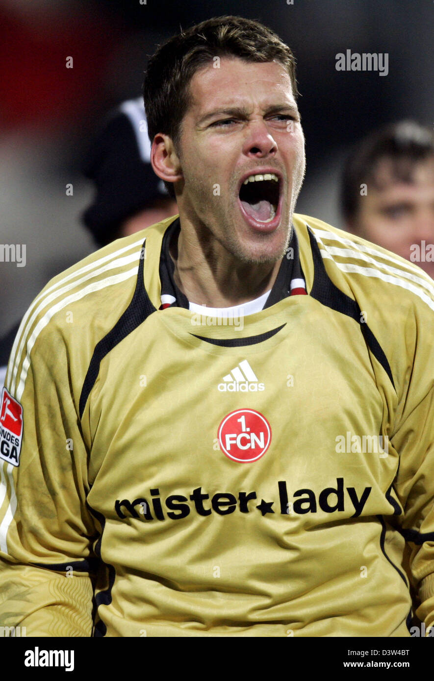 1.FC Nuremberg's goalkeeper Daniel Klewer celebrates after the round of ...