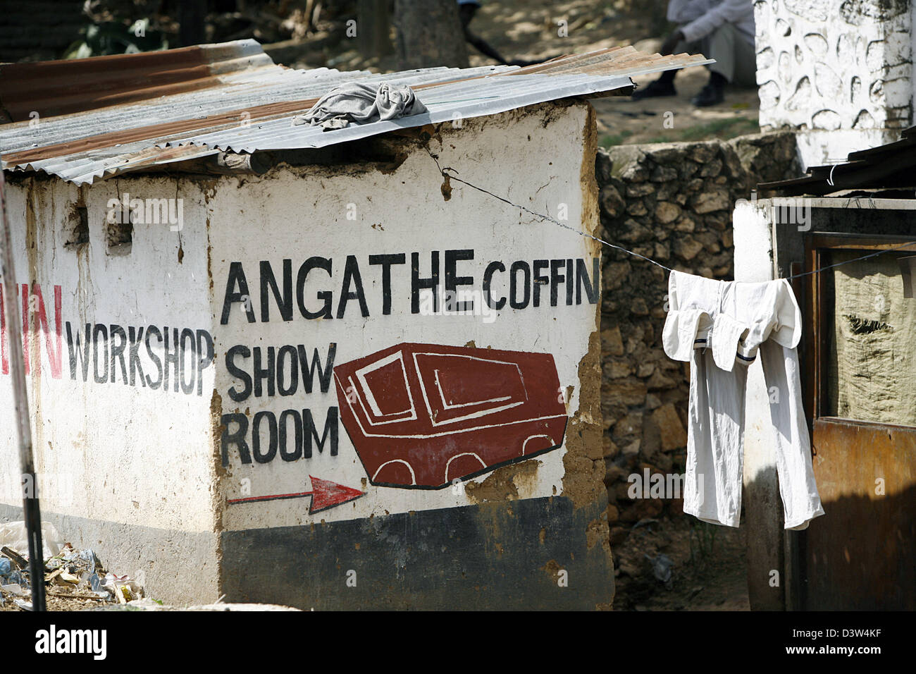 Advertisement for a coffin manufacturer is written on the facade of a ...