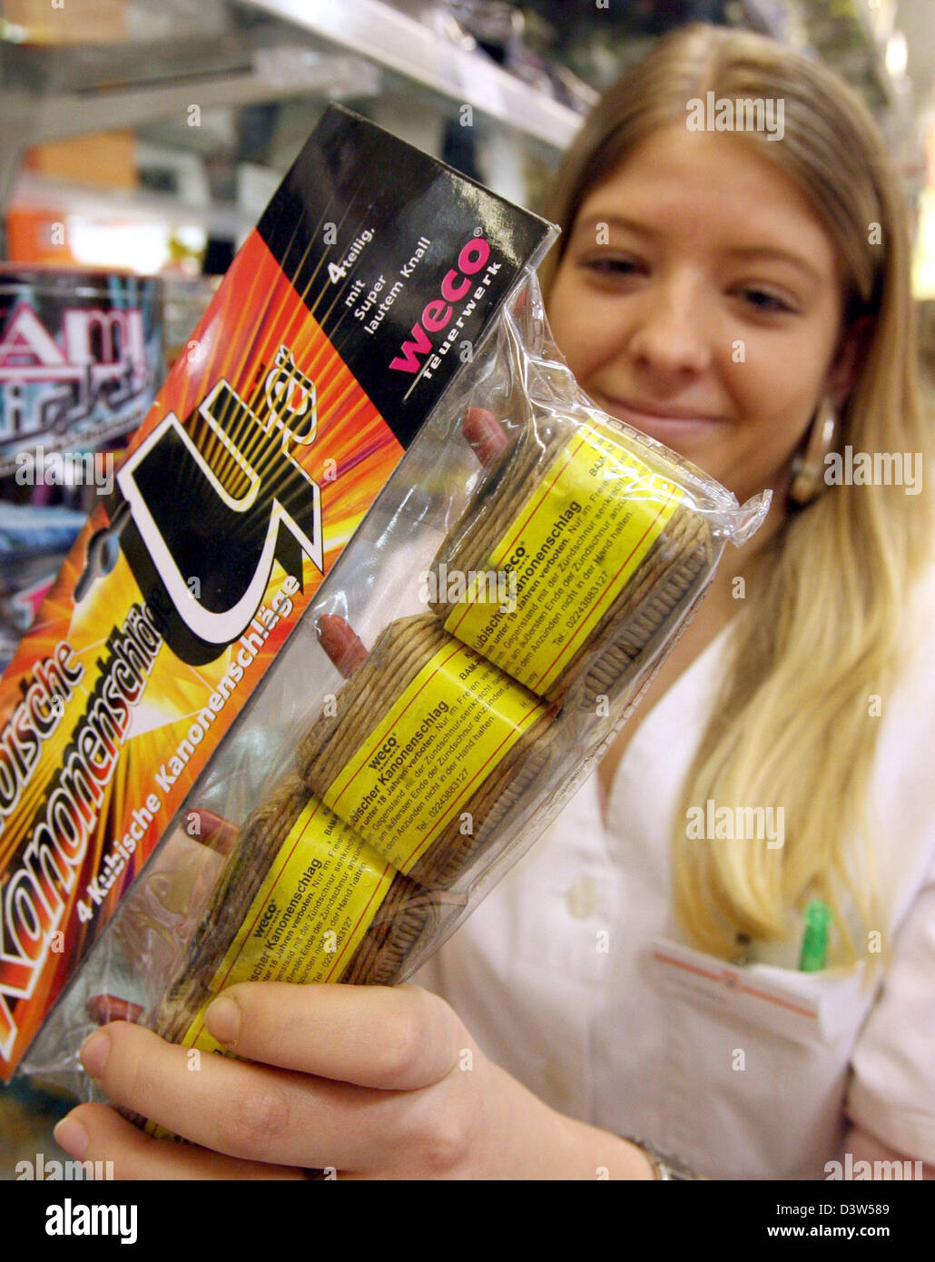 Employee Stefanie Faller presents a couple of firecrackers and ...