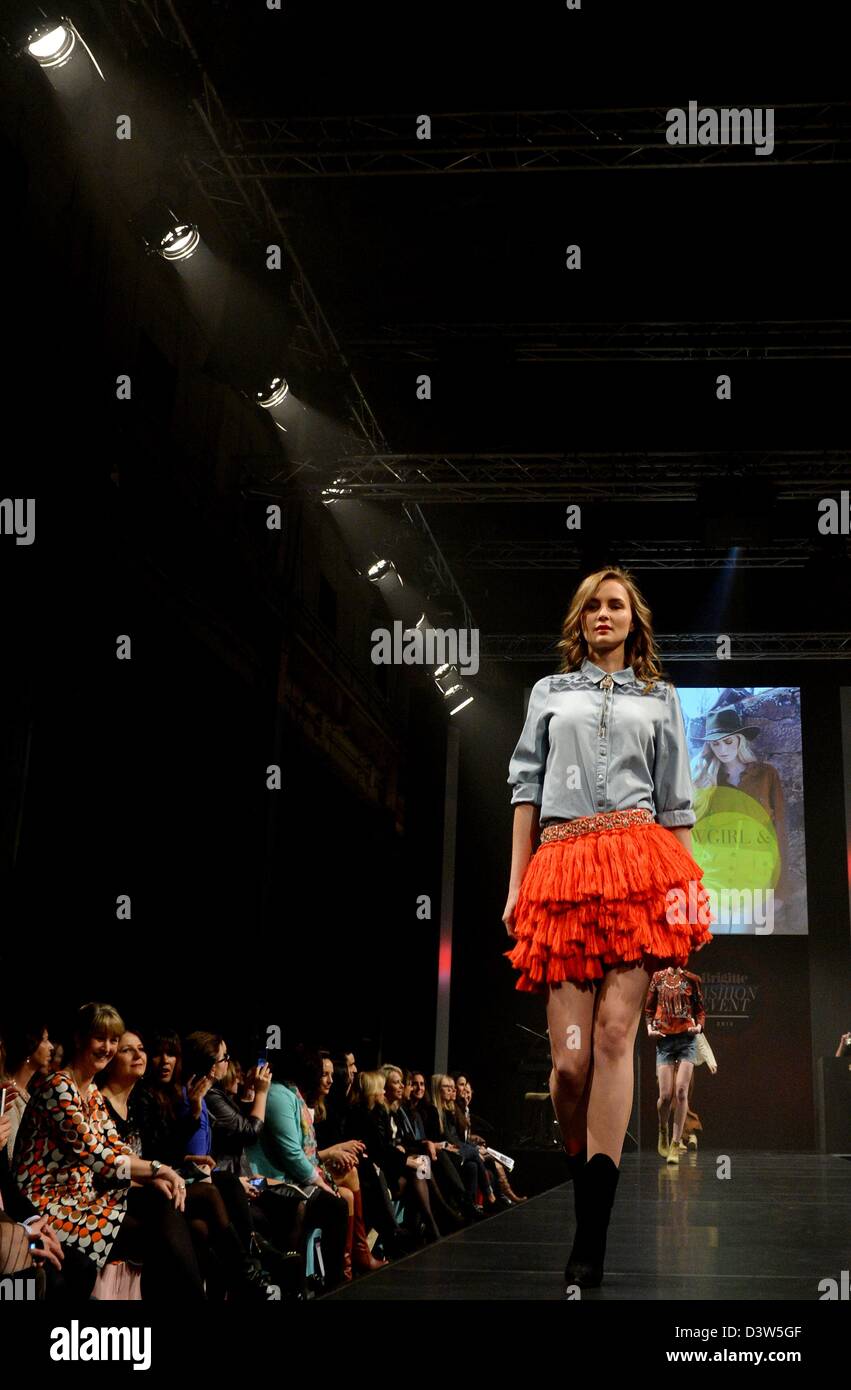 Models pose on the catwalk during the Brigitte Fashion Event 2013 in ...