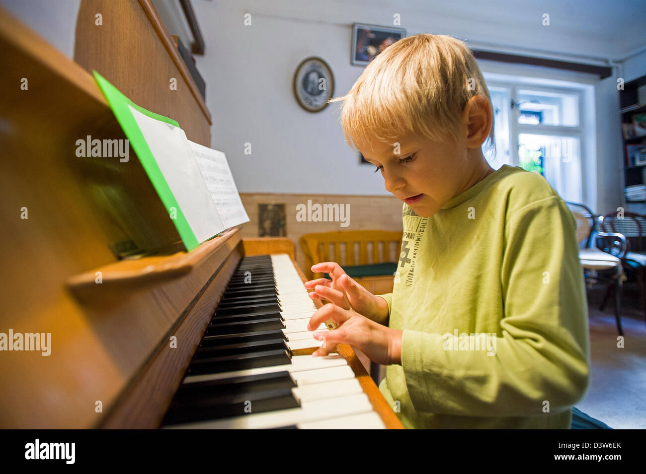 Blond Kid Playing Piano High Resolution Stock Photography and Images ...