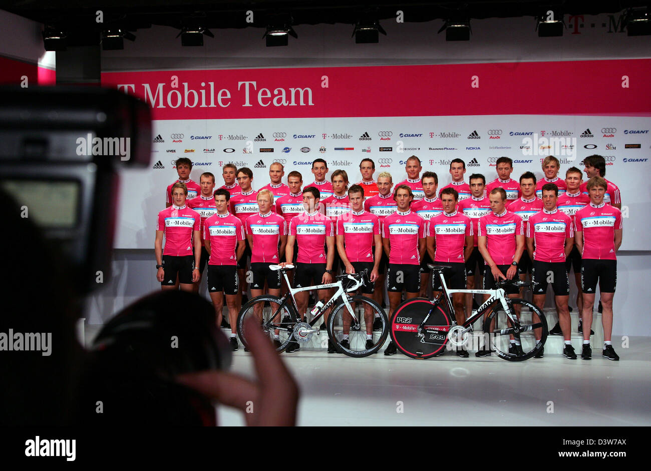 The cycling pros of the new T-Mobile team are pictured on the stage in ...