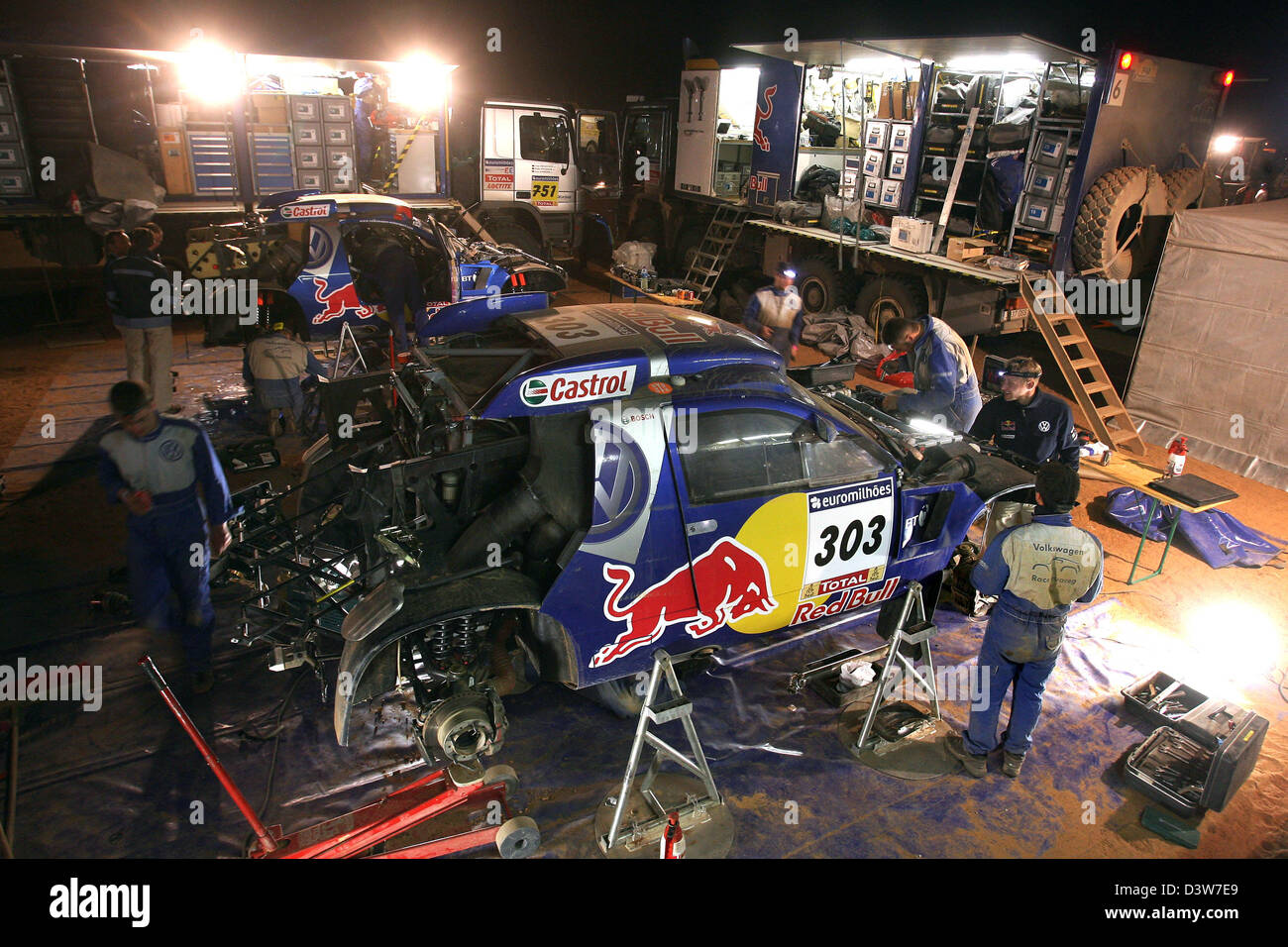 Mechanics check a Volkswagen Race Touareg 2 after the Rallye Dakar 7th ...