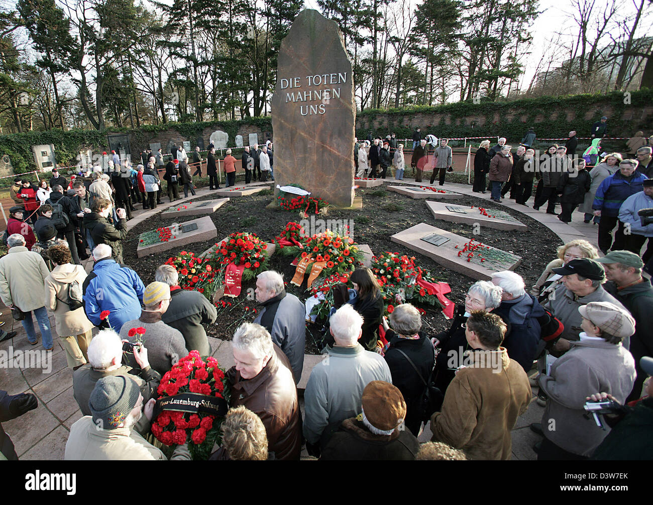Participants of the rememberance are pictured at the memorial for ...