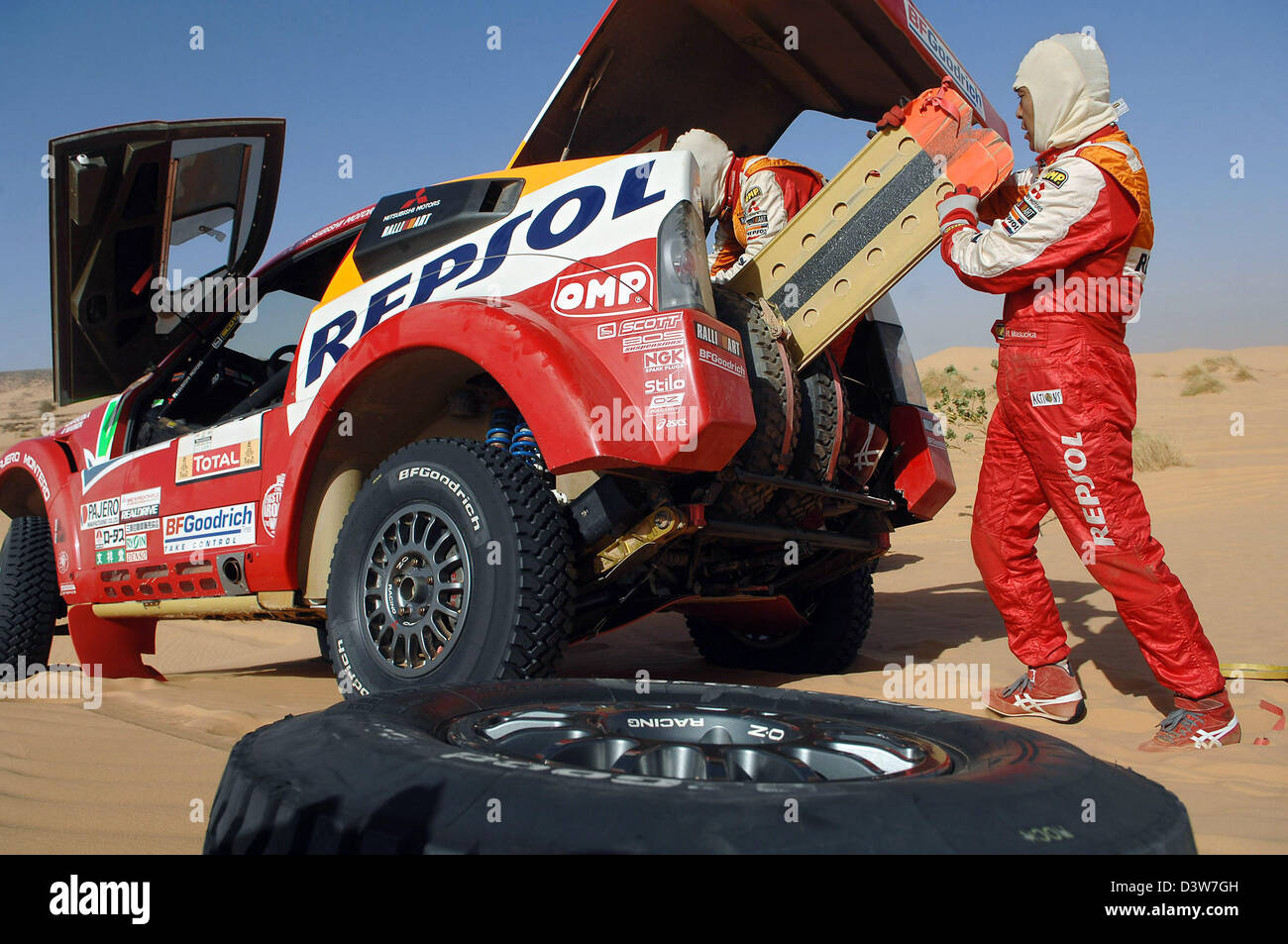 Japanese rally driver Hiroshi Masuoka (R) and his co-driver Pascal ...