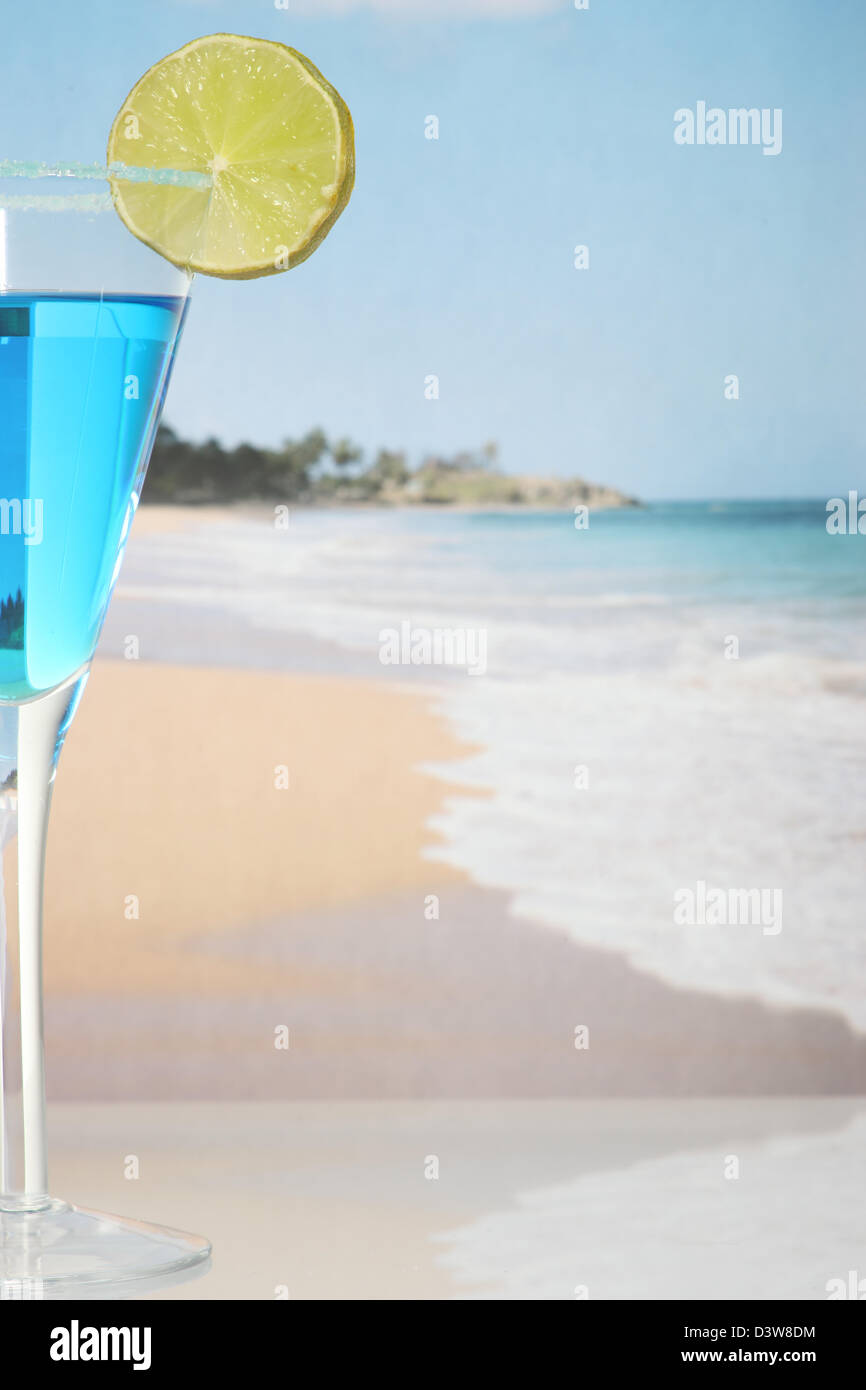 Blue cocktail on beach Stock Photo - Alamy