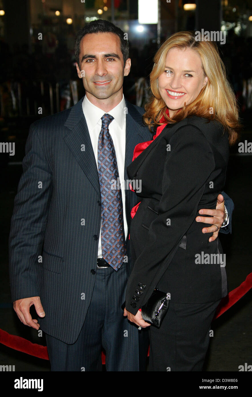 US actor Nestor Carbonell (L) and his wife Shannon Kenny (R) arrive to ...