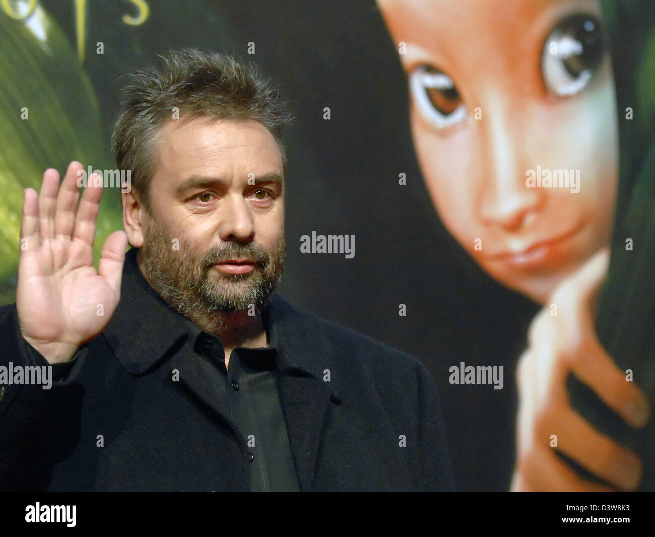 French filmmaker Luc Besson is pictured in front of a placard at the ...