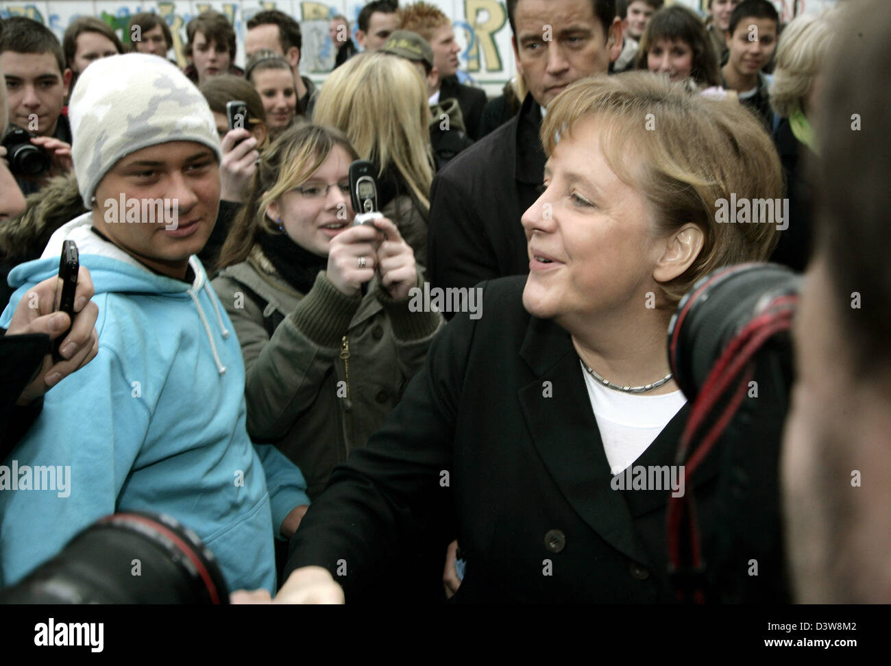 German Chancellor Angela Merkel (R) arrives at the Caspar-David ...
