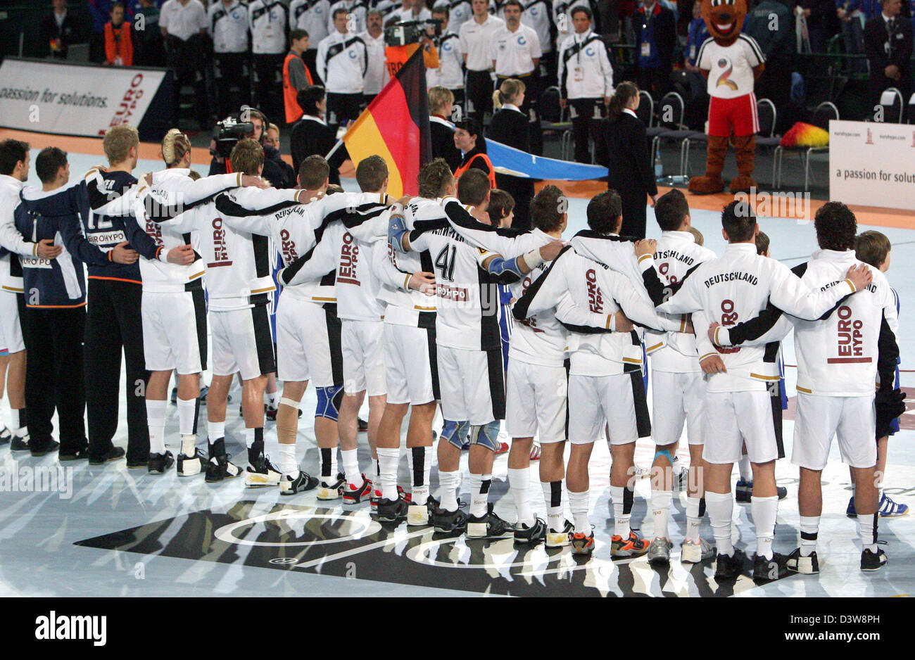 The German national team sings the national anthem prior to the ...