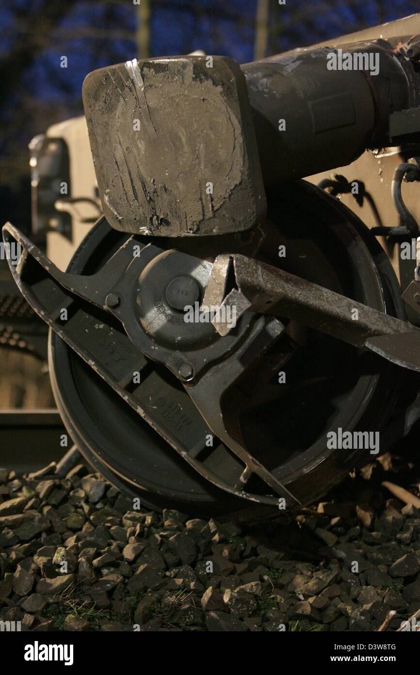 A train wheel lies next to the railway tracks at the accident site of a ...