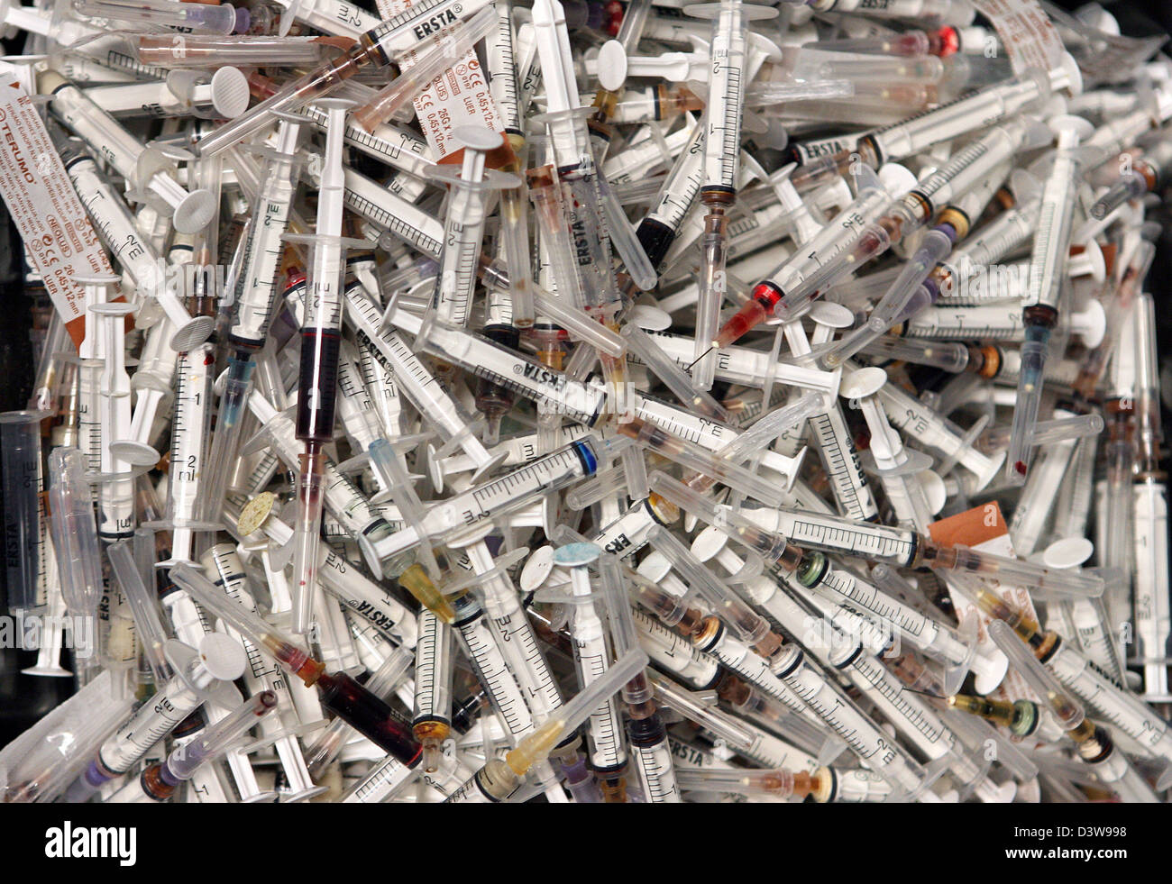 Used needles pictured at the junkie's centre of the AIDS organisation ...
