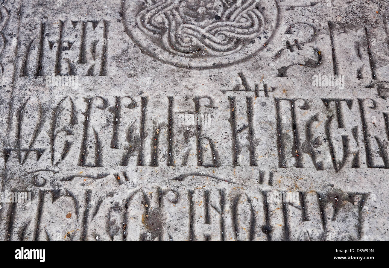 Old Russian inscriptions carved on the tombstone Stock Photo - Alamy