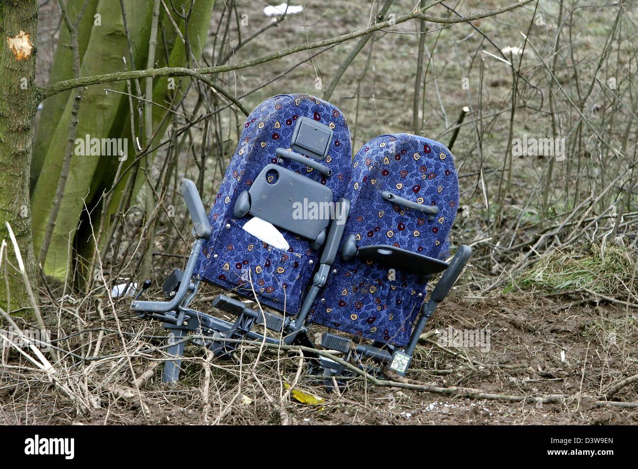 Two seats of a wrecked coach are pictured on a slope after an accident ...