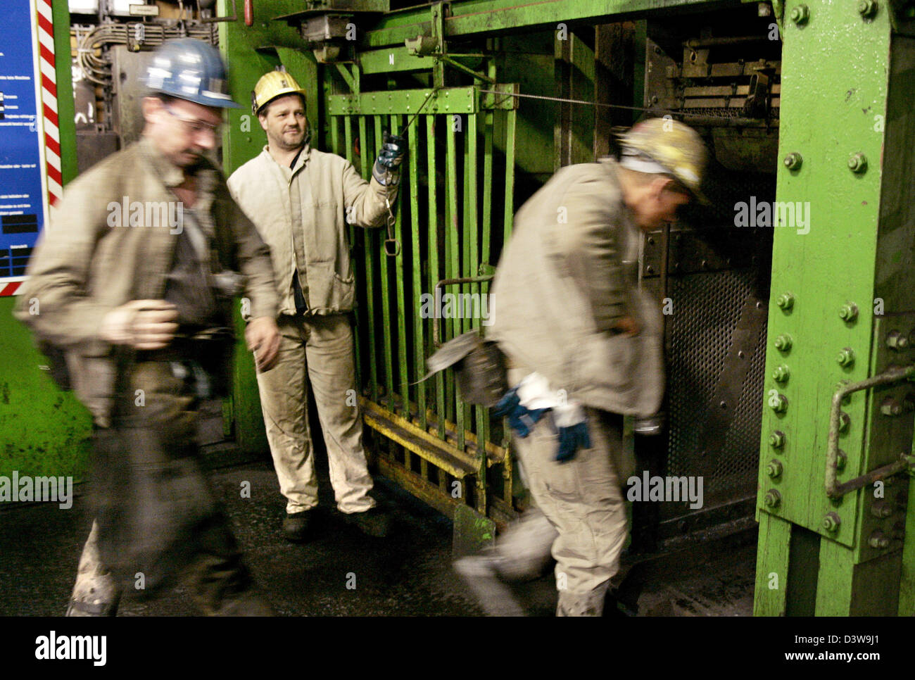 Miner enter the hoisting cage at the coal-mine Bergwerk West in Kamp ...