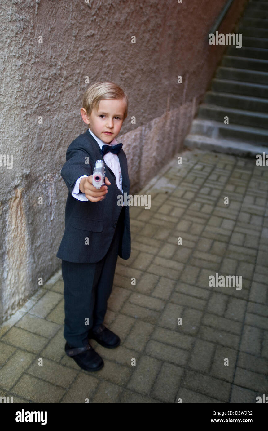 boy with plastic gun Stock Photo - Alamy