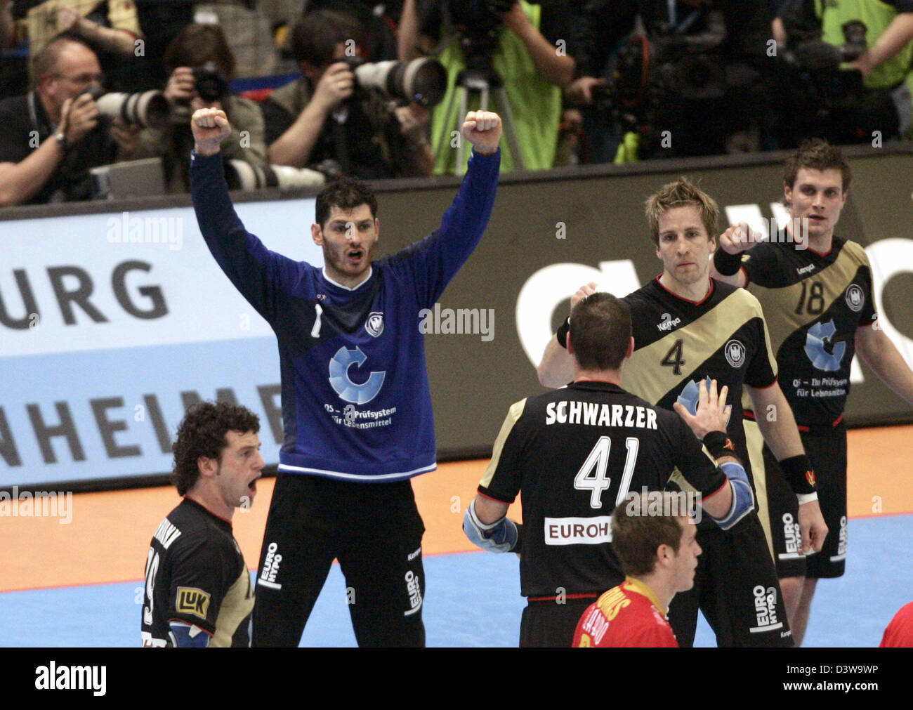 German goalkeeper Henning Fritz raises his arms into the air during the ...