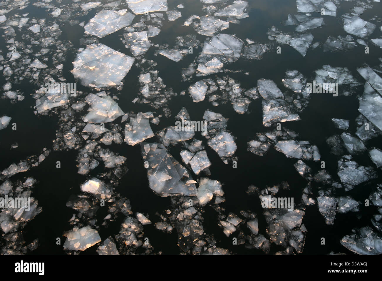 Broken ice on a river Stock Photo - Alamy