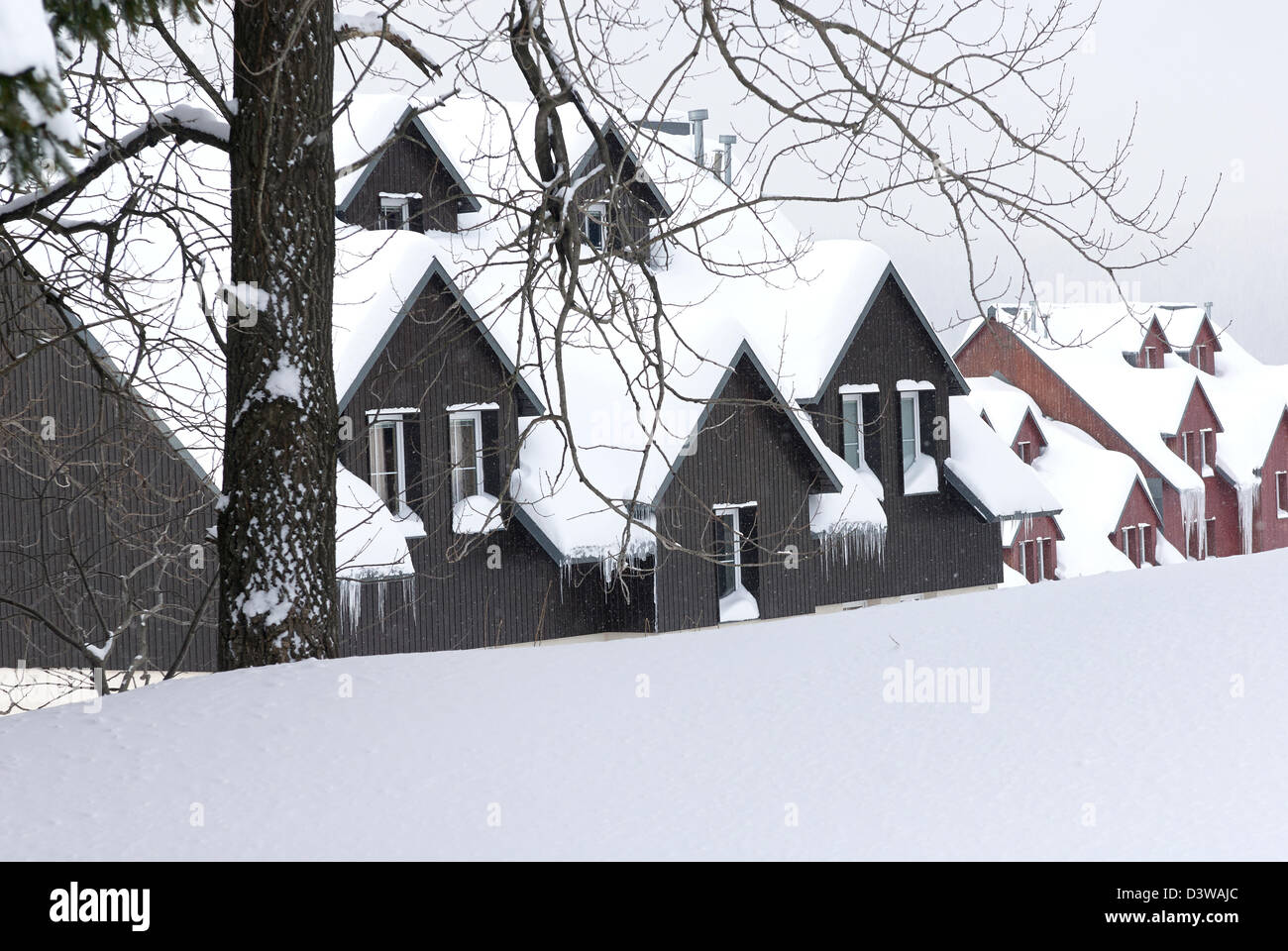 Snow covered house roofs mountain hi-res stock photography and images ...
