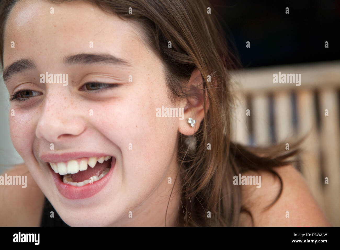 Young girl laughing Natural Stock Photo - Alamy