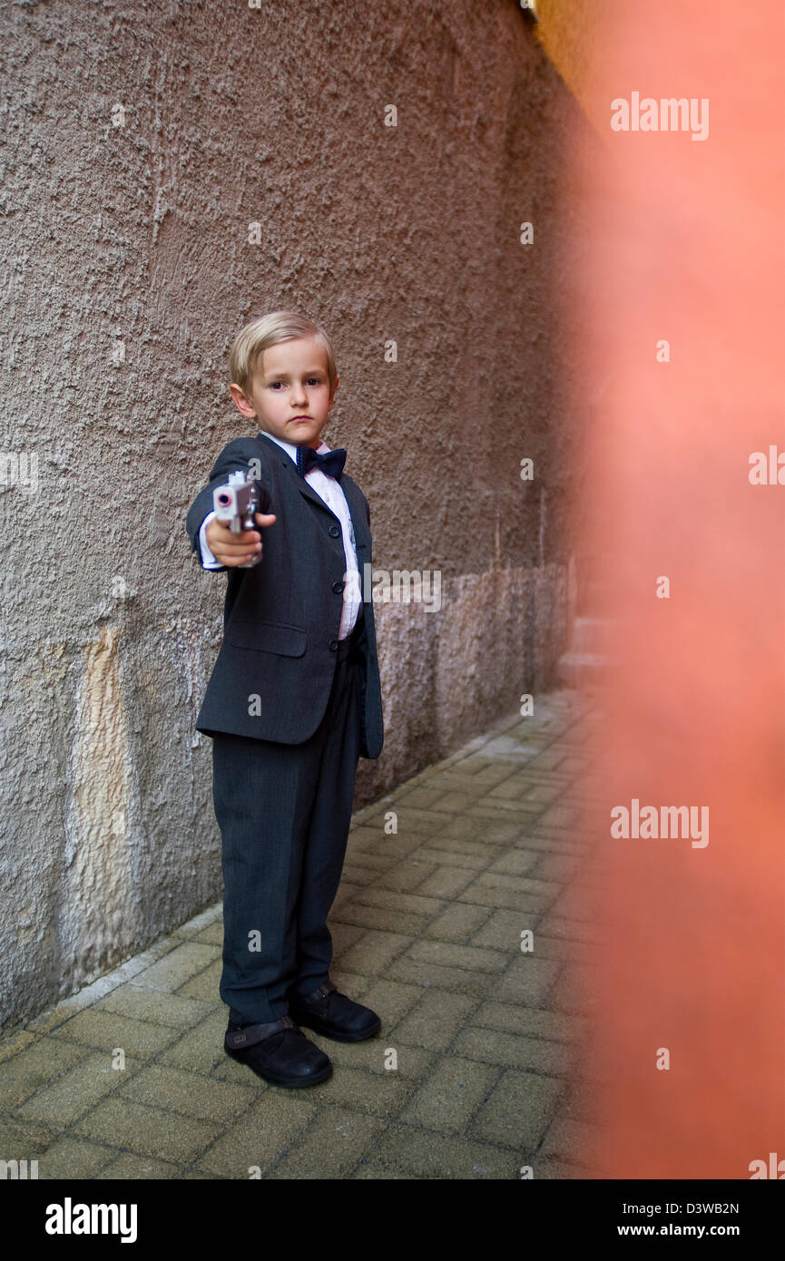 boy with plastic gun Stock Photo - Alamy