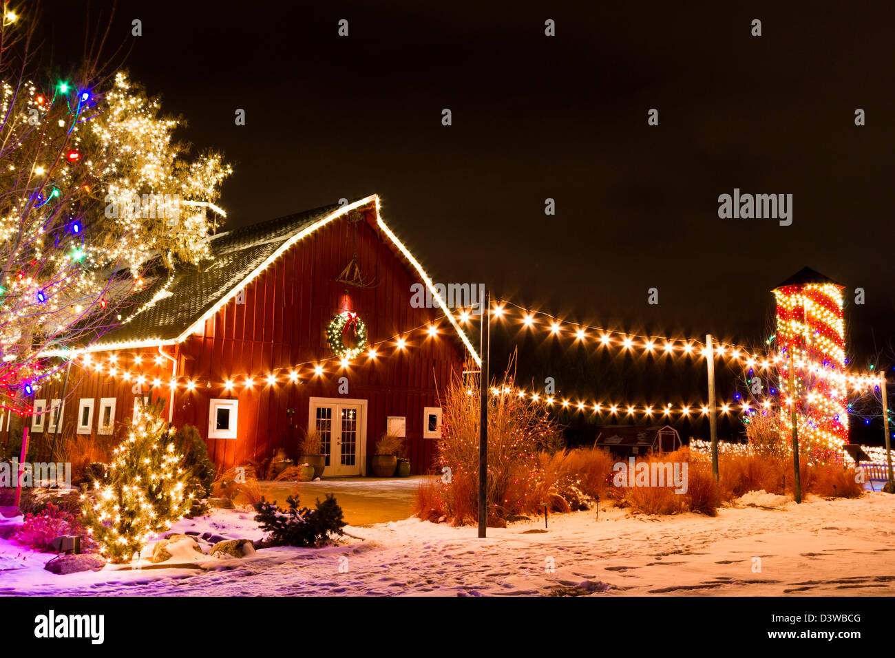 Historic farm decorated with Christmas lights Stock Photo - Alamy