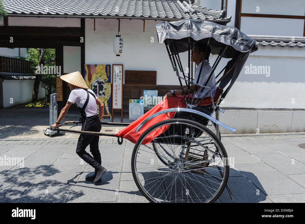 Man pulling a rickshaw in front of a temple, Kyoto, Japan, Asia Stock ...