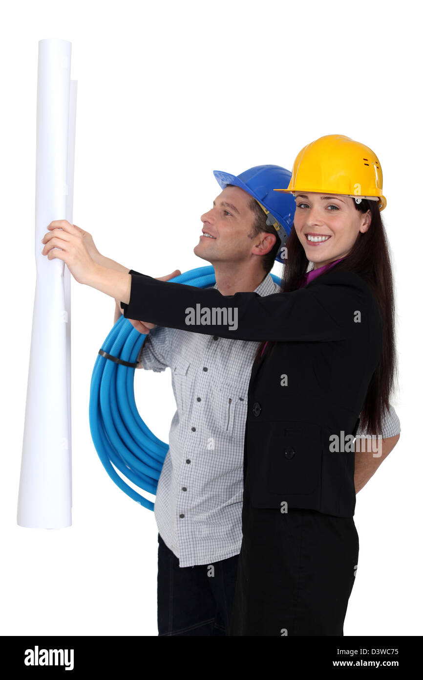 Male and female builders Stock Photo - Alamy