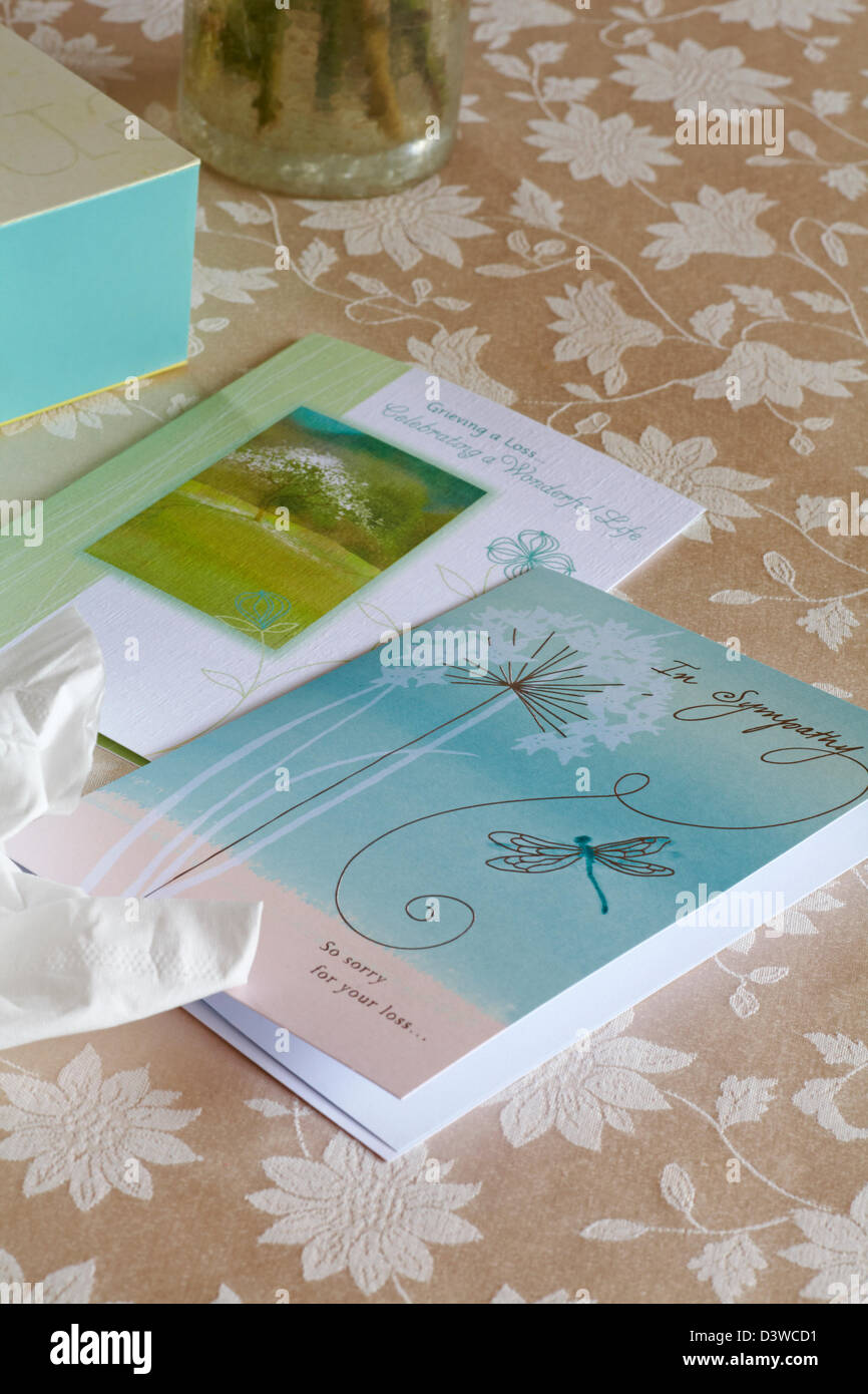 Sympathy cards and box of tissues on tablecloth Stock Photo - Alamy