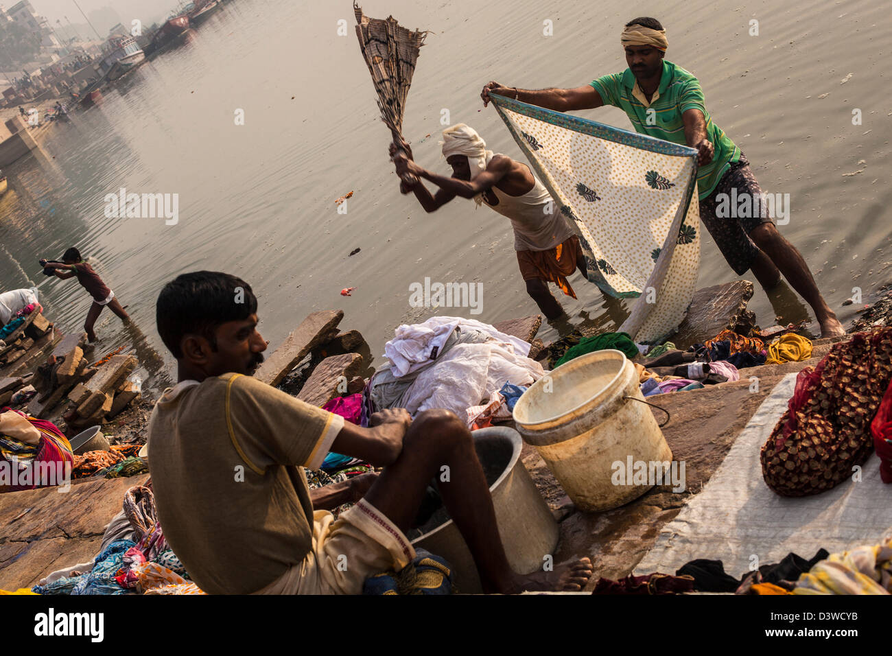 Man washing clothes river in hi-res stock photography and images - Alamy