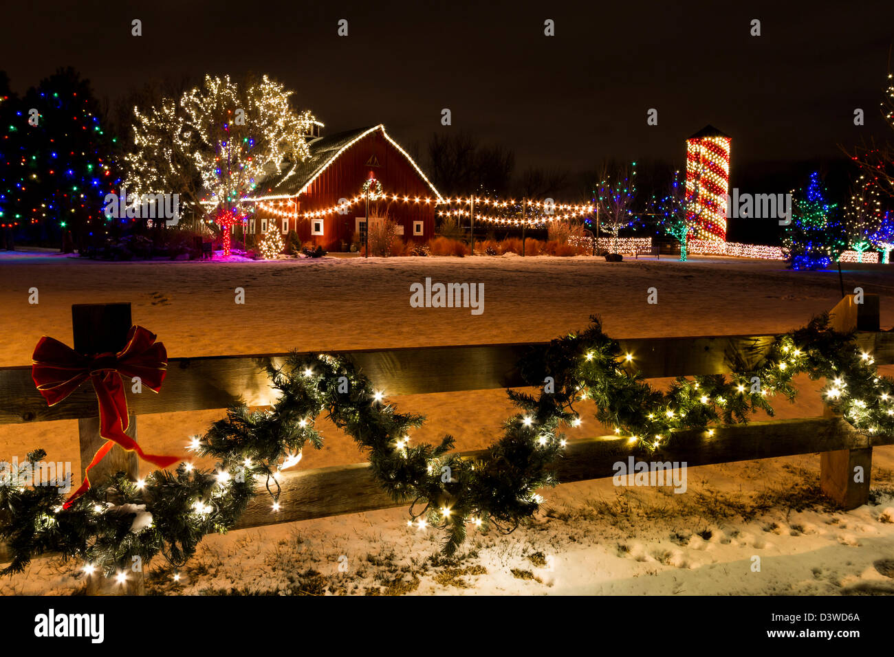 Historic farm decorated with Christmas lights Stock Photo - Alamy