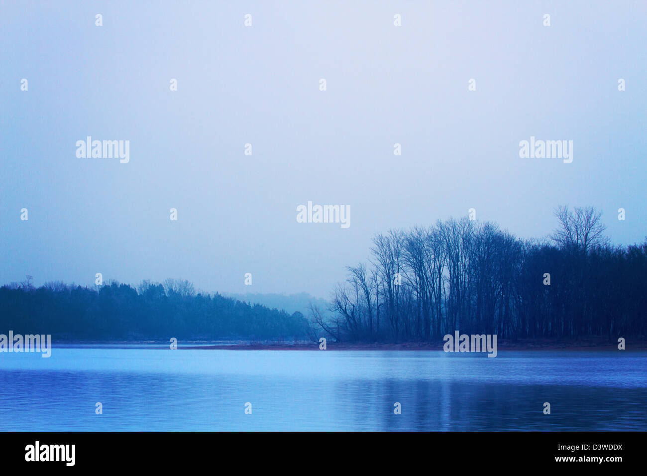 A foggy lake scene Stock Photo - Alamy
