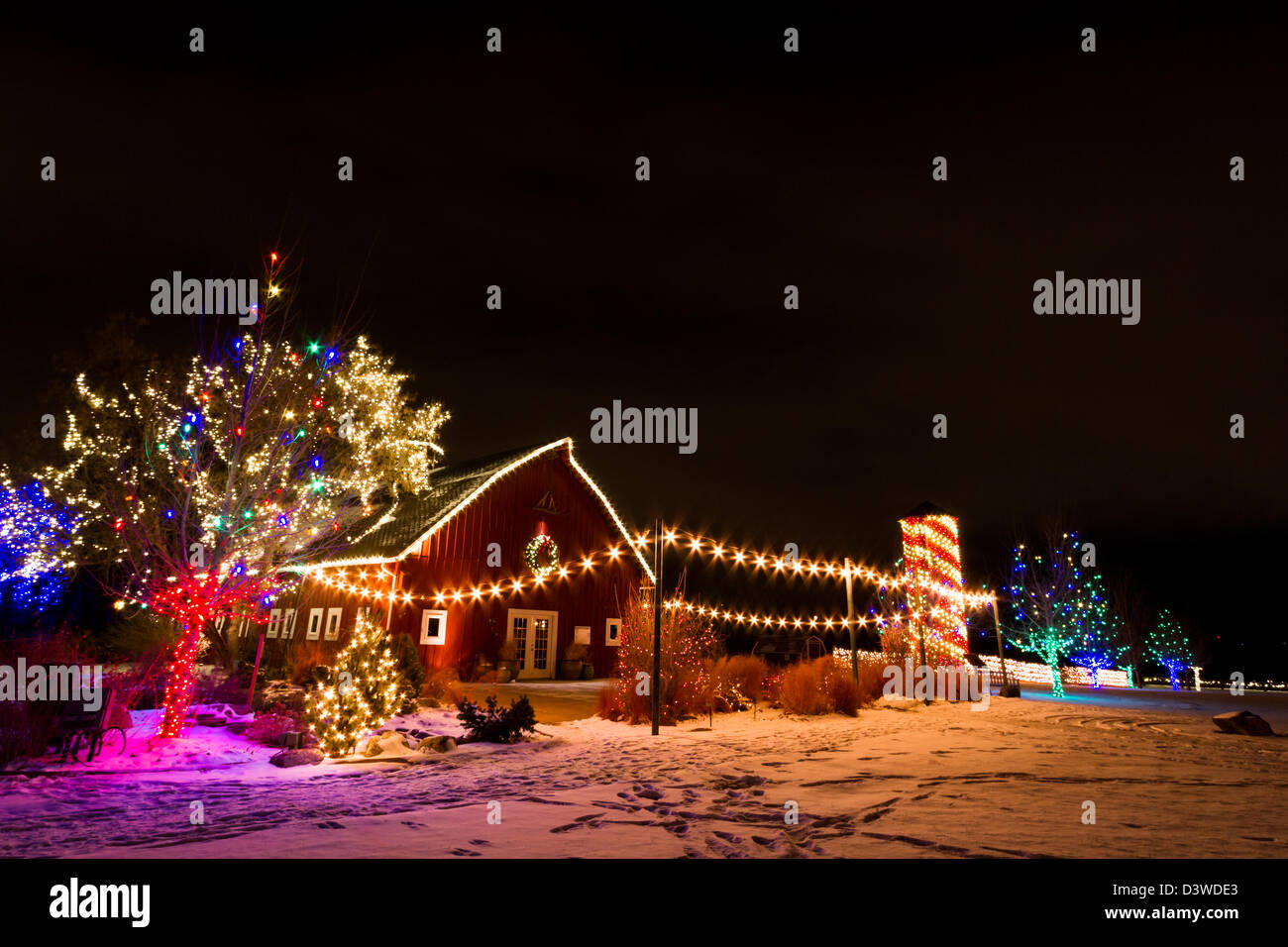 Historic farm decorated with Christmas lights Stock Photo - Alamy