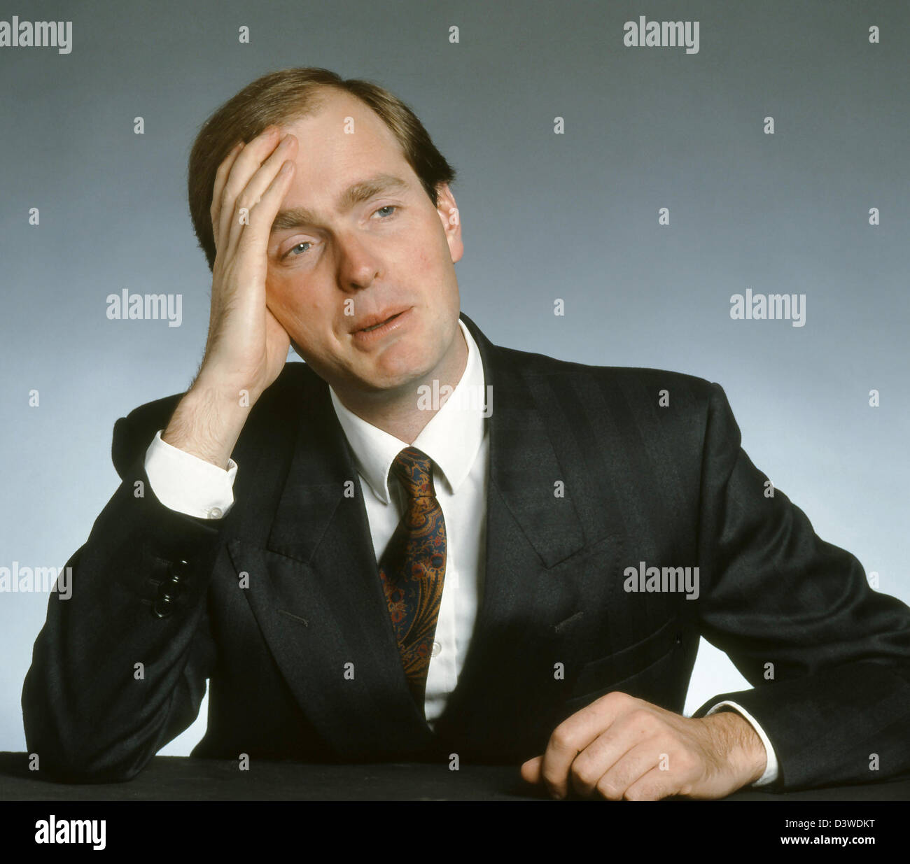 Stressed Worried Man man with problems, man dressed in suit and tie ...