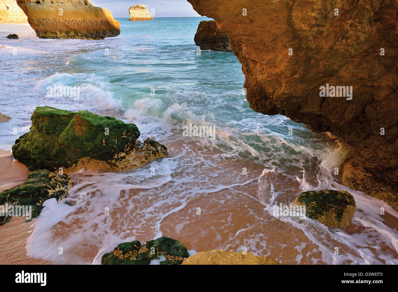 Portugal, Algarve: Rock formations and waves at beach Praia da Marinha ...