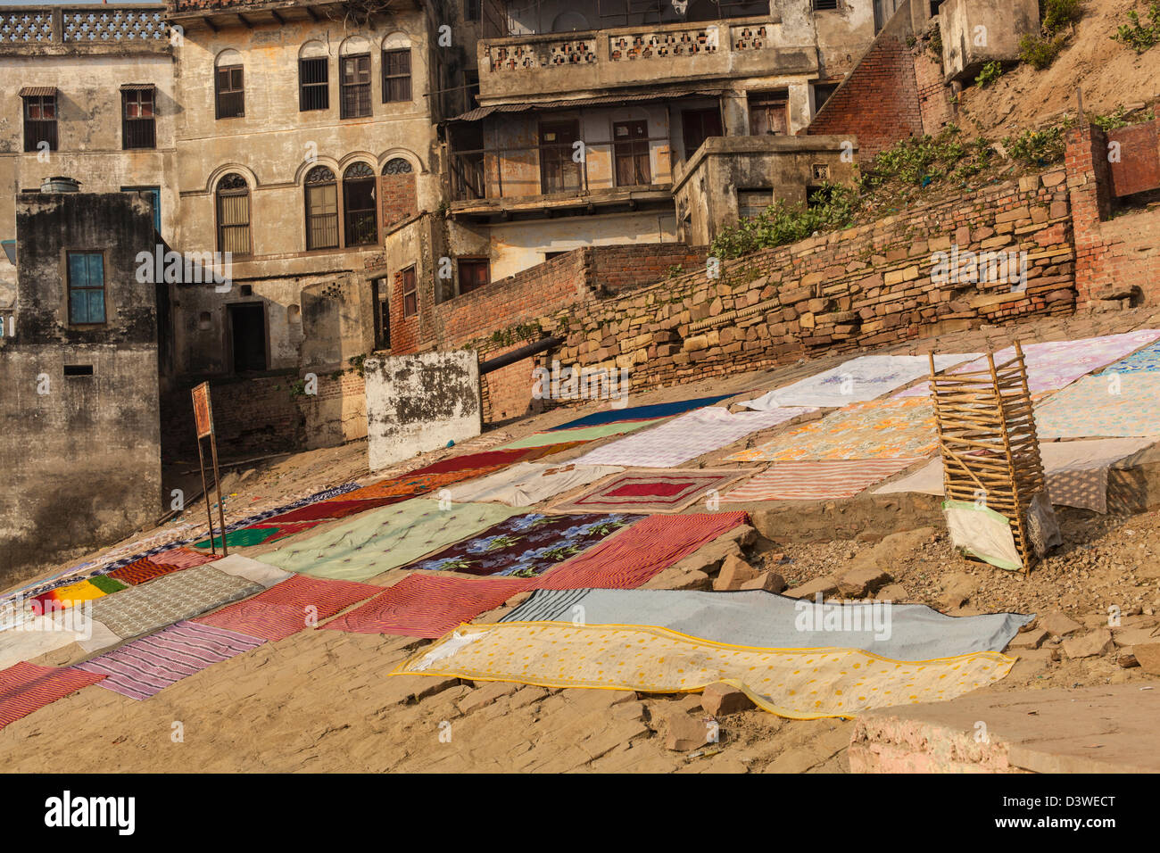 washing laid out to dry in the sun, Varanasi, India Stock Photo - Alamy