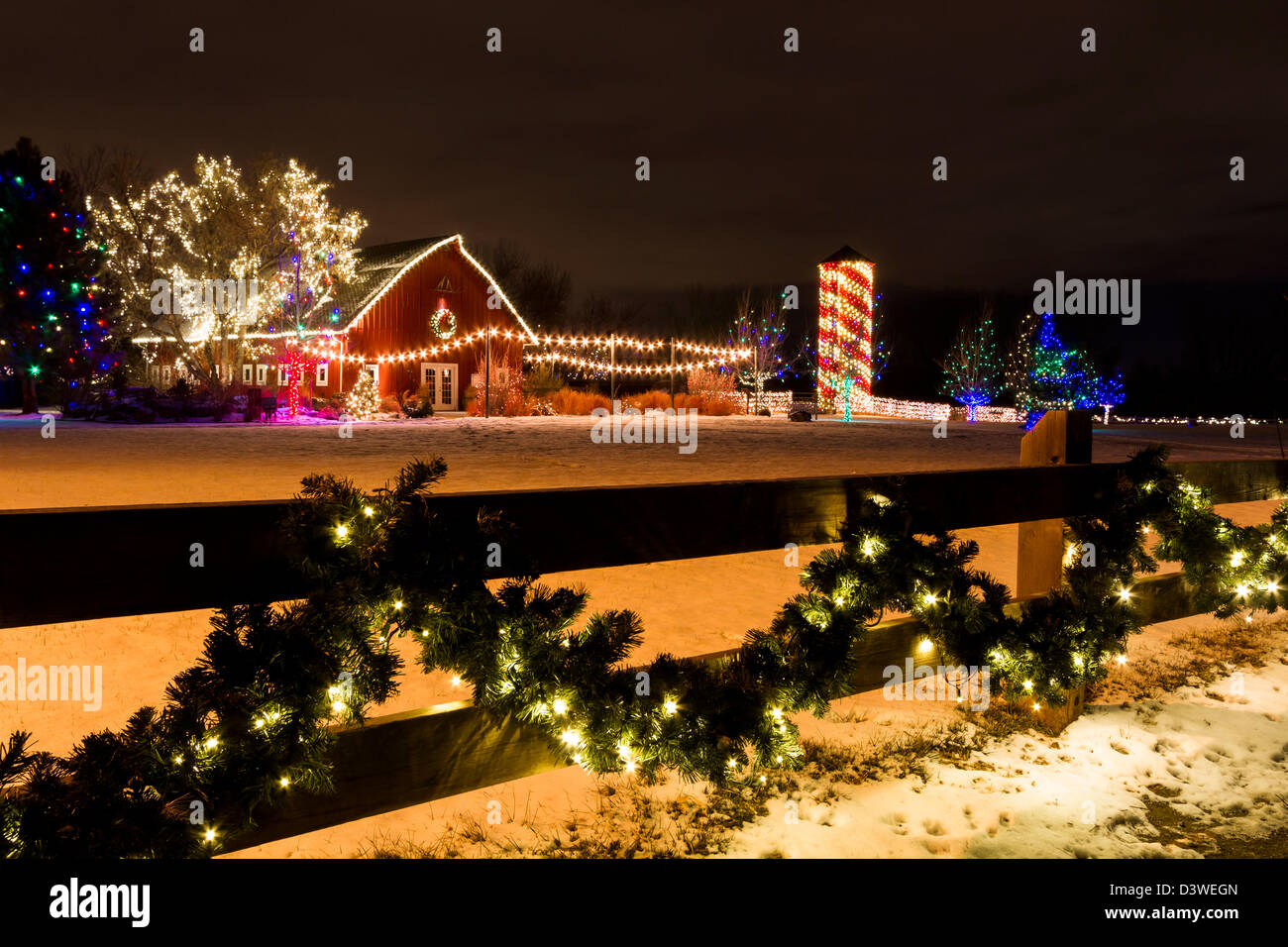Historic farm decorated with Christmas lights Stock Photo - Alamy