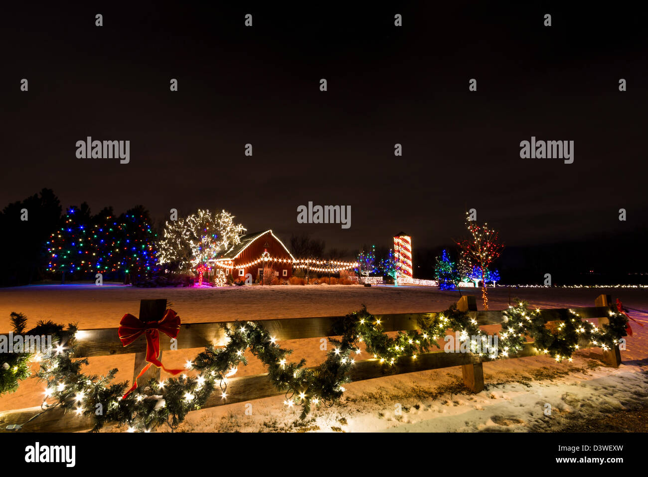 Historic farm decorated with Christmas lights Stock Photo - Alamy