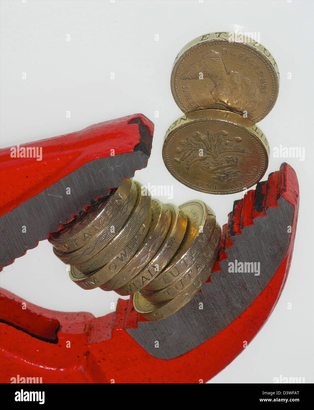 The Squeezed Pound Sterling Under Pressure money crisis Stock Photo - Alamy