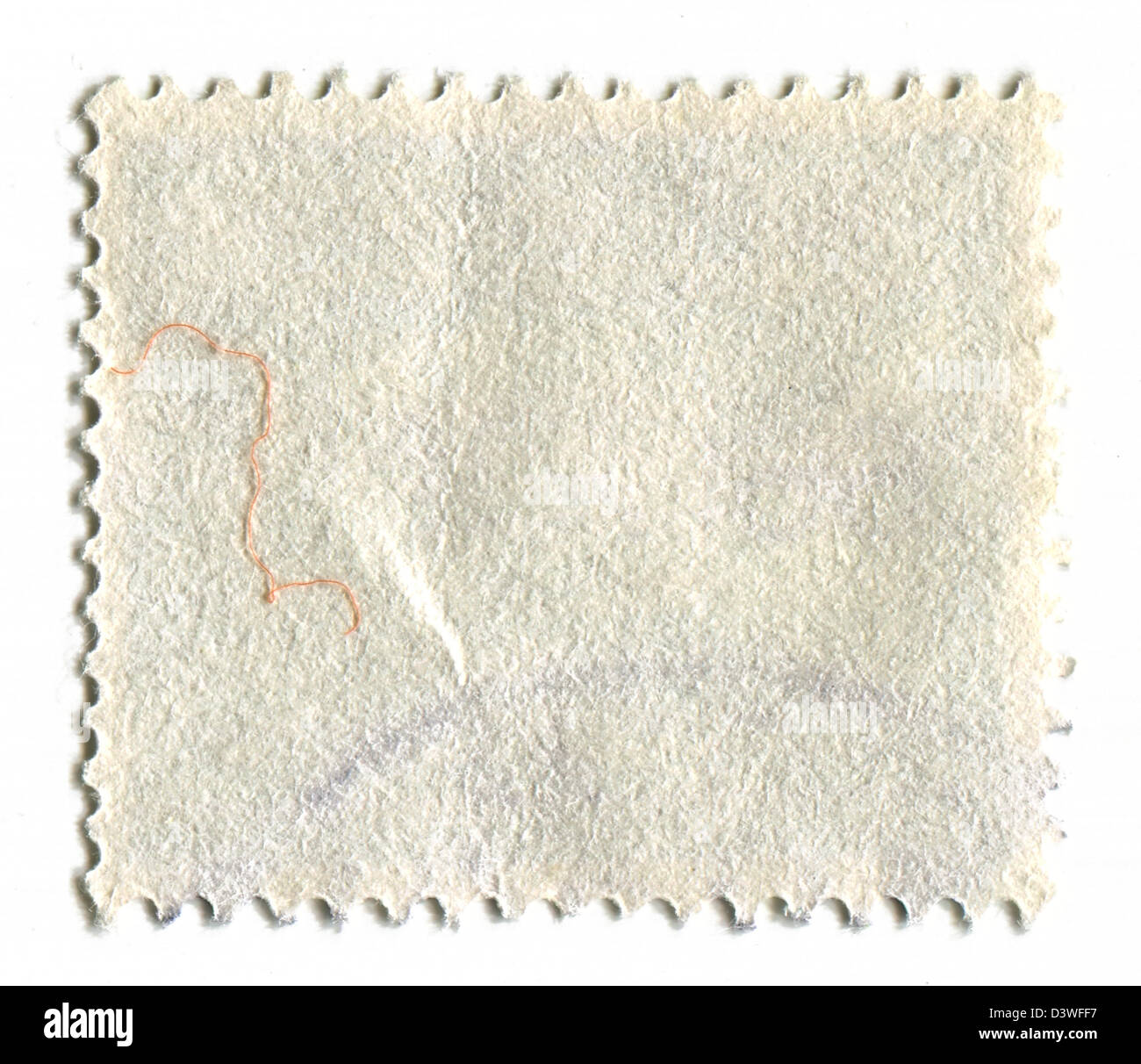 The reverse side of a postage stamp Stock Photo - Alamy