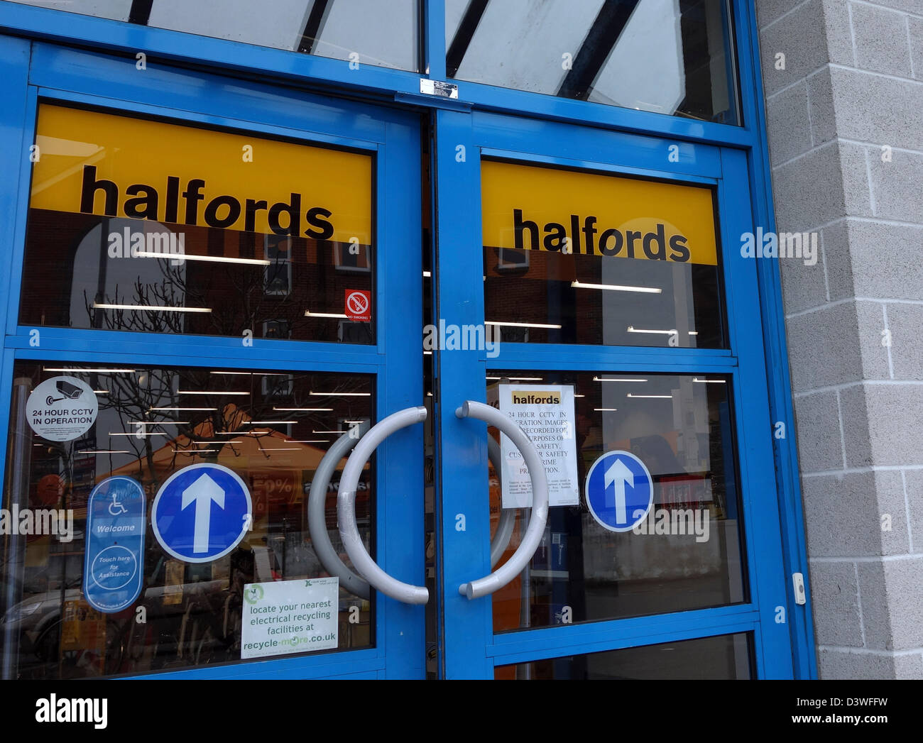The entrance to a halfords store Stock Photo - Alamy