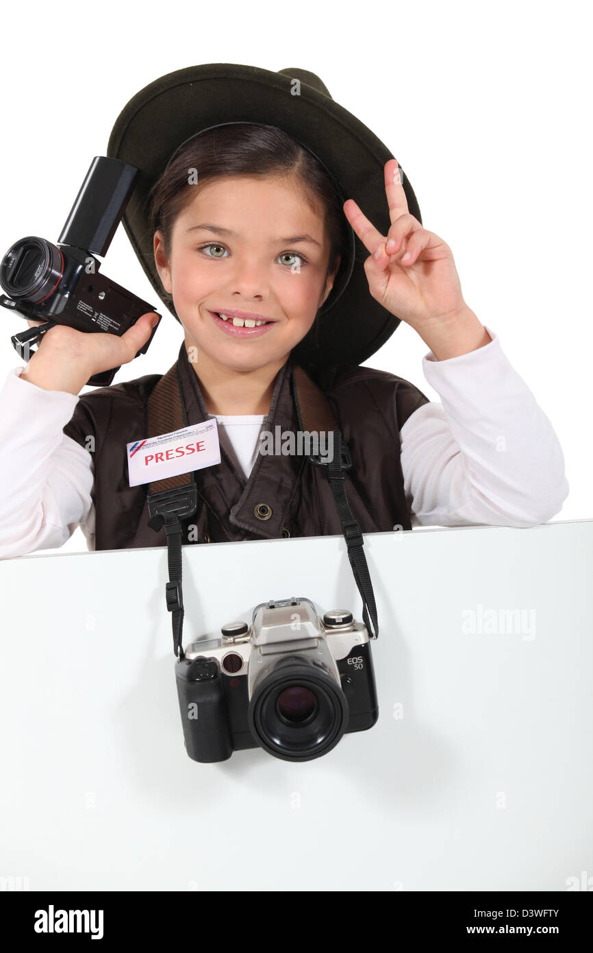 little girl dressed as a adventure reporter Stock Photo - Alamy