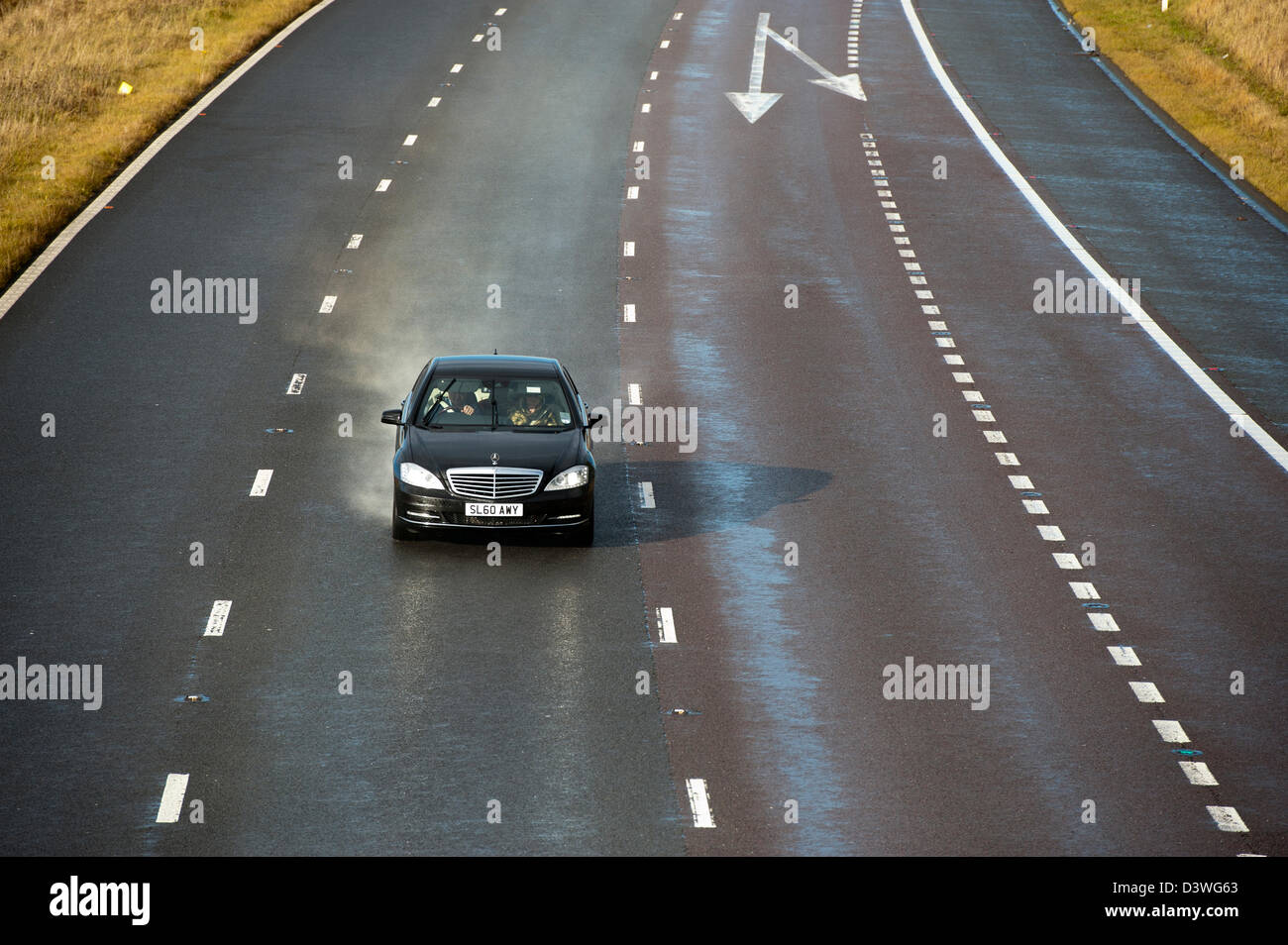 Road spray from vehicles hi-res stock photography and images - Alamy
