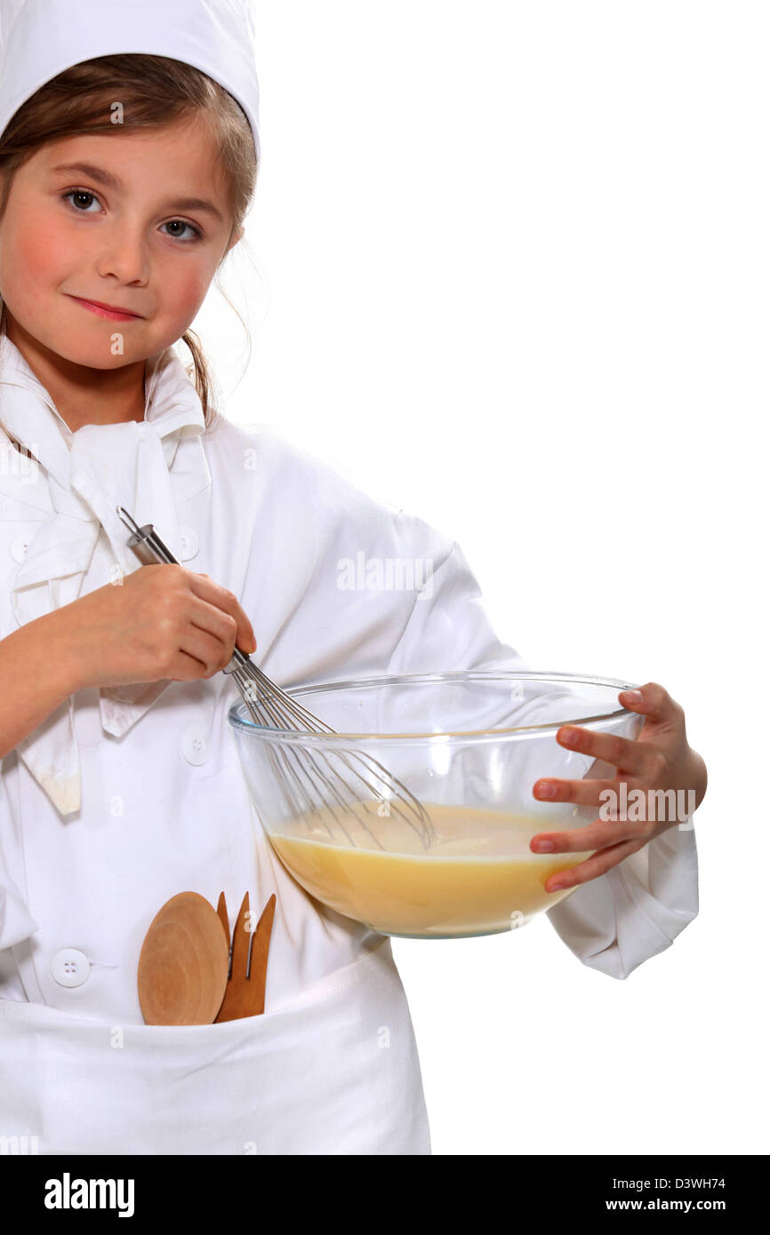 portrait of a little girl in baker clothes Stock Photo - Alamy